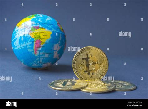Bitcoin Btc Crypto Currency Gold Coins And Earth Globe Worldwide New Virtual Money Concept
