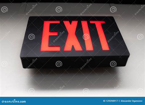 Black Sign That Reads EXIT In Red Letters Stock Image Image Of White Symbol