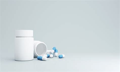 흰색 플라스틱 병 용기에서 유출 된 파란색과 흰색 캡슐 알약 글로벌 헬스케어 개념 항생제 약물 내성 항균 캡슐 제약 산업 약국 3d 렌더 0명에 대한 스톡 사진 및 기타