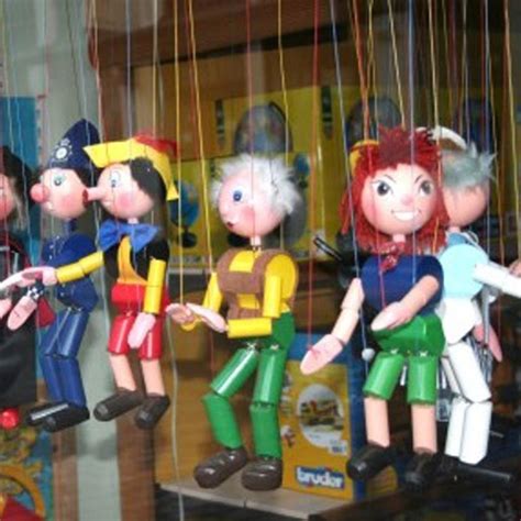 Puppets On A String The International Educator Tie Online Puppets On A String The International Educator Tie Online