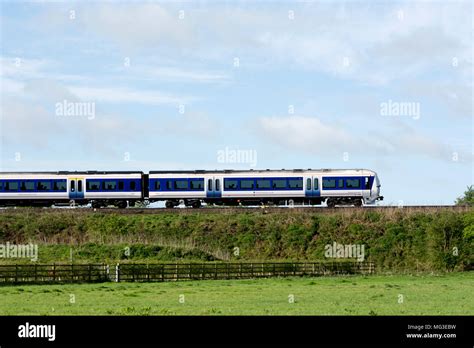 Chiltern Railways Class 165 Diesel Train Side View On An Embankment Warwickshire Uk Stock