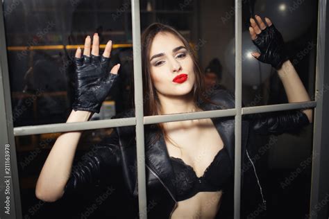 Girl Look Out Of Window Woman With Makeup Face Long Curly Hair Through Glass Beauty Look