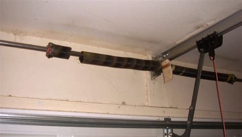 Garage Door Torsion Spring Replacement Cost — Schmidt Gallery Design