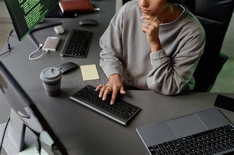 Female It Developer Typing On Computer Keyboard Working At Desk In