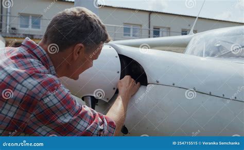 Private Airplane Inspection Aviation Engineer Close Up Pilot Checking