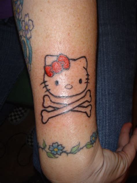 35 Cute And Crazy Hello Kitty Tattoo Design Entertainmentmesh