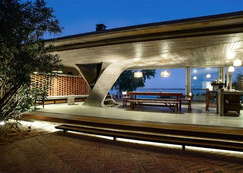 Pavilion By Ne Ar Houses A Fireplace Inside A Twisted Column