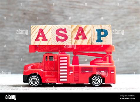 Toy Fire Ladder Truck Hold Letter Block In Word Asap Abbreviation Of As Soon As Possible On