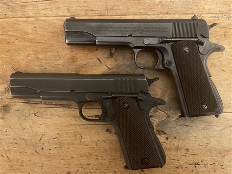 1941 Blued Usgi Colt 1911a1 And Late 1943 Parkerized Colt 1911a1 Jan