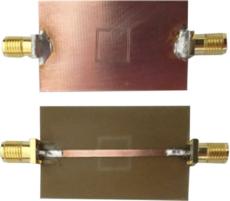fabricated csrr prototype ground plane on top and microstrip line on