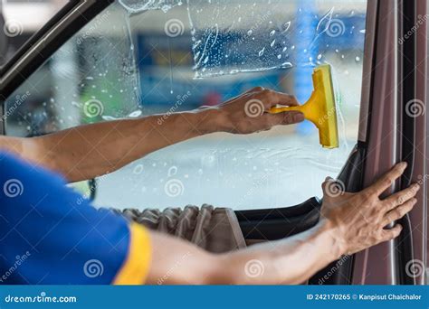 Technician Installing Car Window Tint Car Window Tinting Series Car Window Tinting Specialist