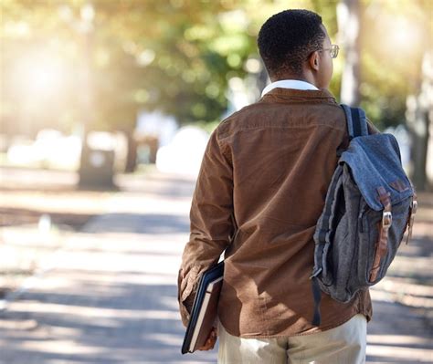 Premium Photo Black Man Walking Or Backpack On Campus Park Nature Or