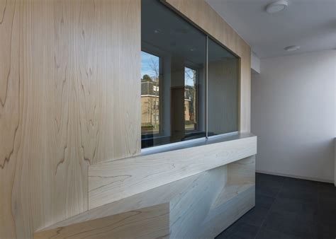 Joshua Florquin Creates Angular Wooden Joinery For Doctors Surgery