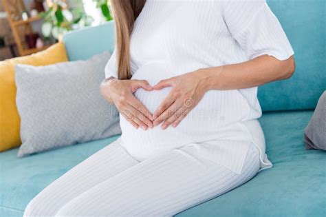 Photo Of Attractive Charming Gentle Girl Mama Mom Sitting On Sofa