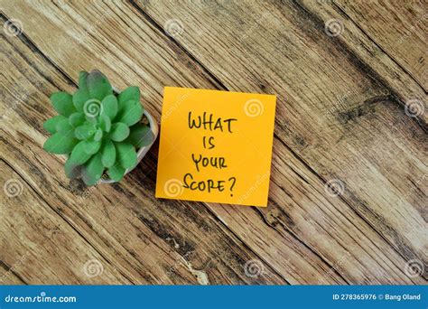 Concept Of What Is Your Score Write On Sticky Notes Isolated On Wooden