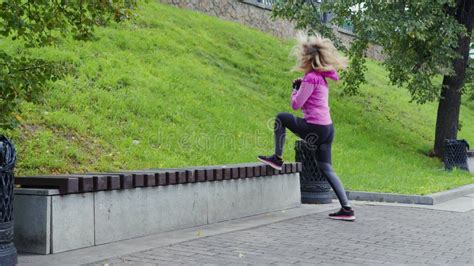 Girl Jumping On A Park Bench Stock Video Video Of Moving Street