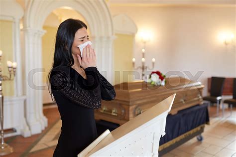 Woman Crying Near Coffin At Funeral In Church Stock Image Colourbox