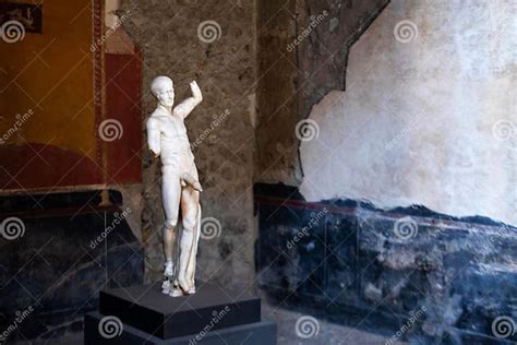 Ancient Statue Of Priapus Symbol Of The Fertility In Pompeii Stock