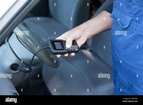 Man Using Car Diagnostic Scan Tool Stock Photo Alamy