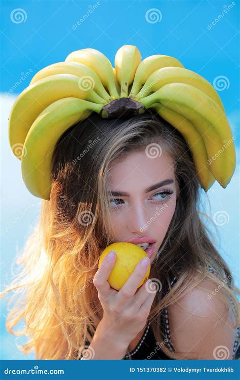 Tropical Girl Eating Lemon Woman On Caribbean Sea In Bahamas Summer Vacation And Travel To