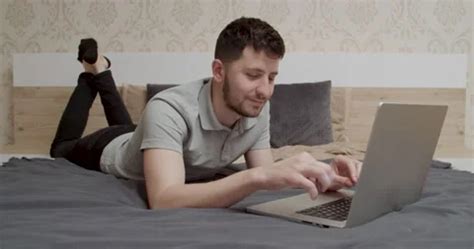 Man Typing Text On Laptop Keyboard Lying Stock Video Pond