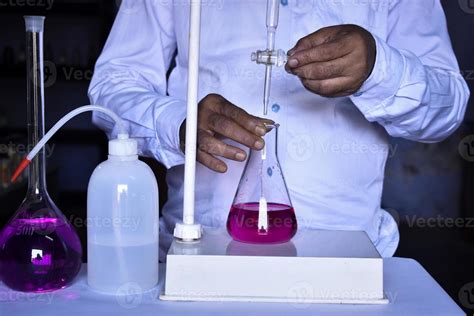 The Chemist Conducts Acid Base Titration Accurately Measuring And Adding Solutions 22648800