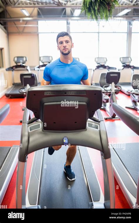 Man Running On A Treadmill Stock Photo Alamy