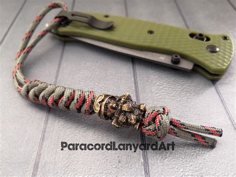 Темляк брелок из паракорда Вежливый человек в интернет магазине на Ярмарке Мастеров Брелок