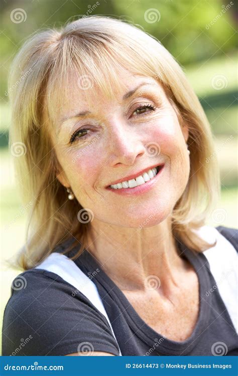 Outdoor Portrait Of Smiling Senior Woman Stock Image Image Of Camera
