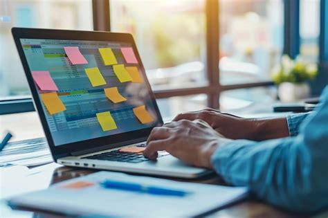 Business Developer Using Kanban Board Framework On Laptop Computer Agile Software Development