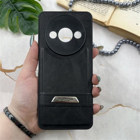 قاب گوشی Redmi A3 Redmi A3x شیائومی چرم Unimor اورجینال دوختی لوگو فلزی مشکی محافظ لنز دار کد