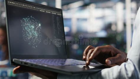 Close Up Of Data Center Worker Using Laptop To Interpret Ai Data Analytics Stock Footage Video