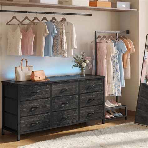 9 Drawer Fabric Dresser With Hanging Rack And Extendable Garment Rodbed