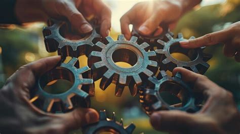 Teamwork And Collaboration With Interlocking Gears Premium Ai