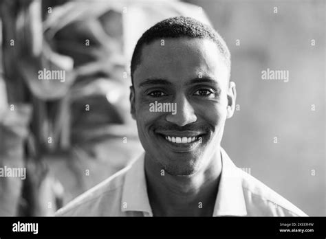 Happy African Business Man Working Inside Modern Office Focus On Face Black And White