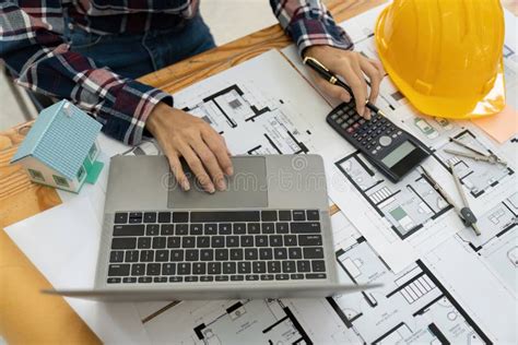 Close Up Architect Or Engineer Using On Calculator For Calculating