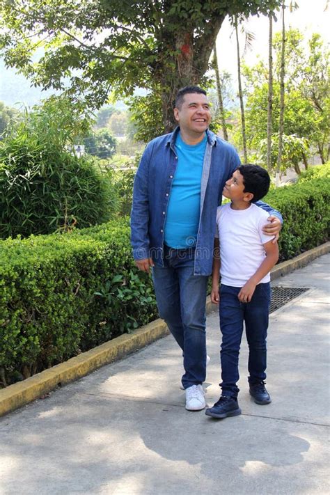 Dad Walks In The Park With His 10 Year Old Dark Latin Son Spend Quality