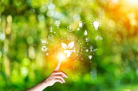 녹색 에너지 개념은 지구 온난화를 줄이는 데 도움이 됩니다 녹색 잎에 자연 배경 전구를 들고 있는 손은 그 주위에 청정 에너지 아이콘이 있다 산업 제로 탄소 개념의 이산화