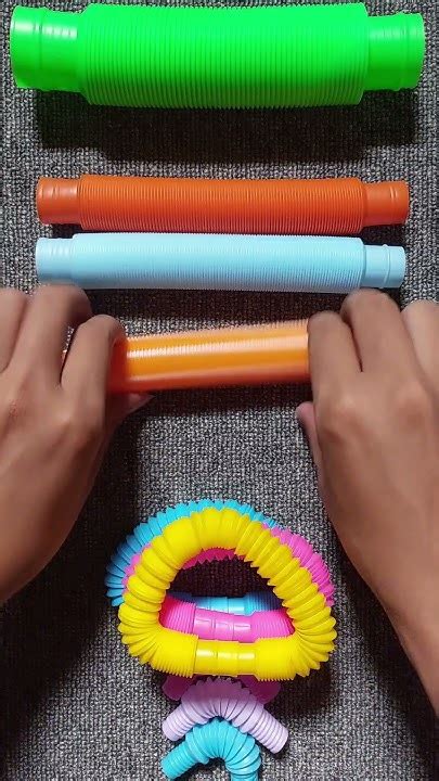 very satisfying sounds from pop tubes🤤😍💙💚 shorts asmr relaxingsounds satisfyingsounds