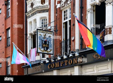 Pub Sign Of Comptons And Rainbow Flag Old Compton Street In Soho