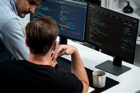 It Developers Discussing Online Software Development Information