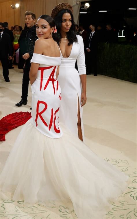Alexandria Ocasio Cortez Whips Up Storm With Tax The Rich Dress At
