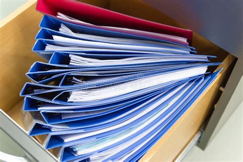 Blue File Folder Documents In A File Cabinet Retention Stock Image