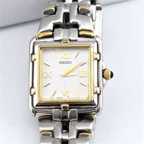Seiko 4n00 7049 Ladies Gold Silver Quartz Roman Numerals Watch Running