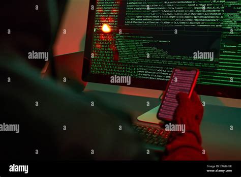 Anonymous People Using Computer And Programming To Break Code Cyber