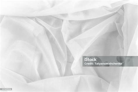 텍스처 배경 패턴입니다 실크 원단흰색의 텍스처입니다 실크 직물은 투명 합니다 직물 또는 액체 웨이브 실크 새틴 질감 또는 벨벳 소재 또는 화이트의 그림 물결 주름 0명에