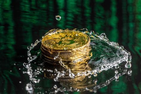 Premium Photo Gold Bitcoin Coin Falling To Water Bitcoin And Water Splash