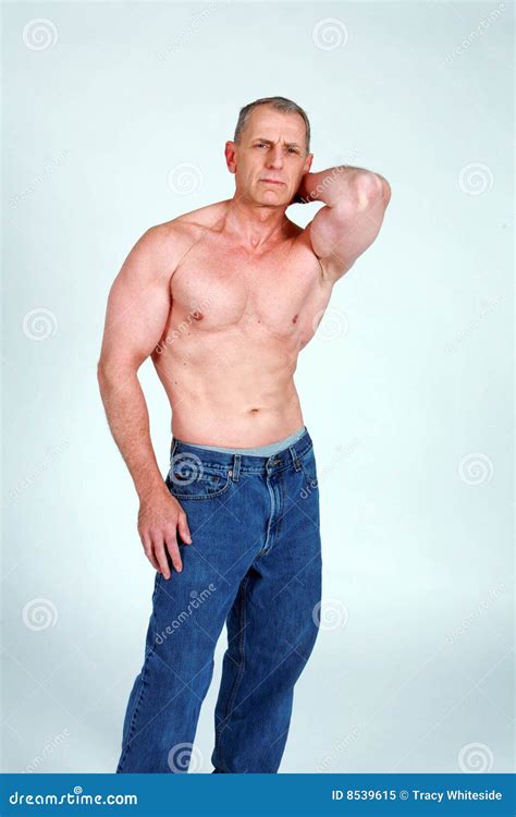 Mature Muscular Man Flexing Muscles Stock Photo Cartoondealer Com