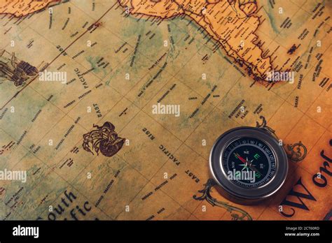 Old Compass Discovery On Vintage Paper Antique World Map Background Retro Style Cartography