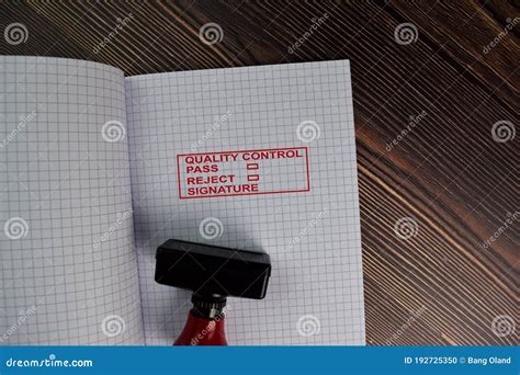 Red Handle Rubber Stamper And Quality Control Pass Reject And Signature Text Isolated On The